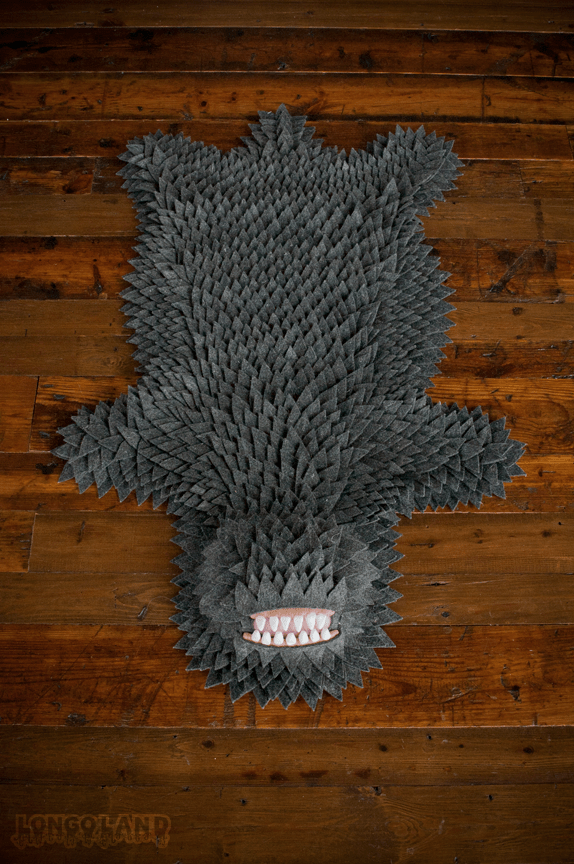 Grey and White Monster Skin Rugs Made of Felt and Clay