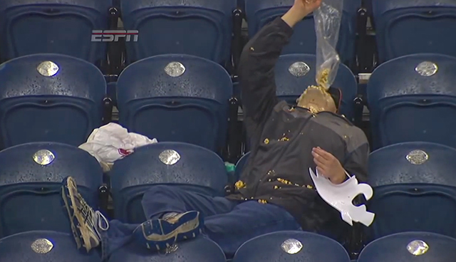 Washington State Fan Pours Popcorn All Over His Face in the Rain During ...