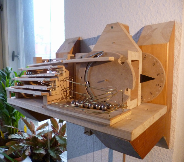 A Curiously Mesmerizing Mechanical Rolling Ball Clock