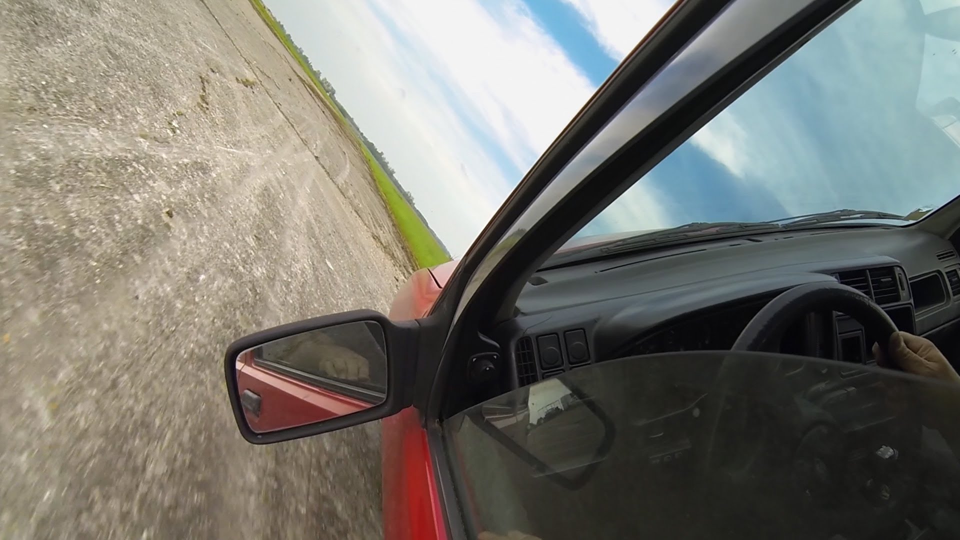 GoPro Video of a Stuntman Driving a Car on Two Wheels