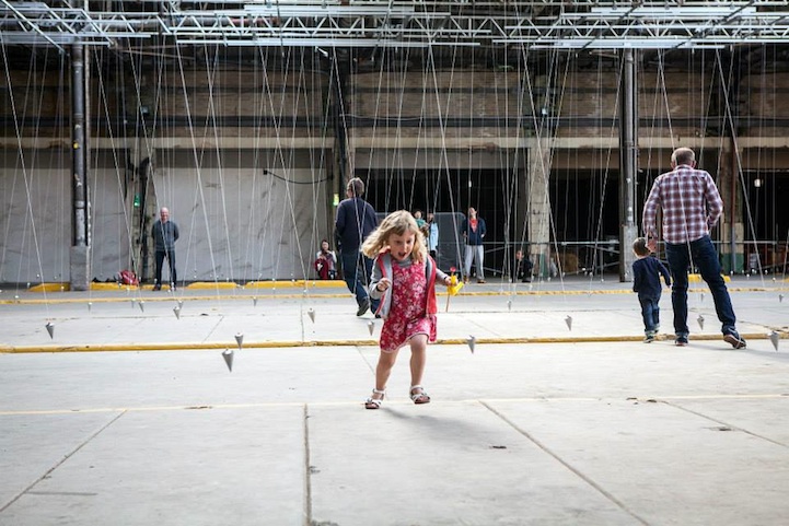 An Interactive Swinging Pendulum Installation That Encourages Participants to Dance