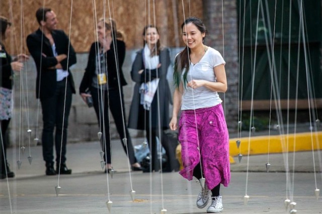 An Interactive Swinging Pendulum Installation That Encourages Participants to Dance
