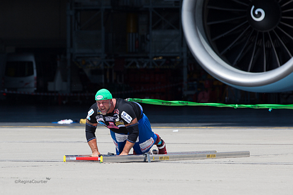 Austrian Strongman Franz Mullner Pulls a Boeing 777 Commercial Airplane ...