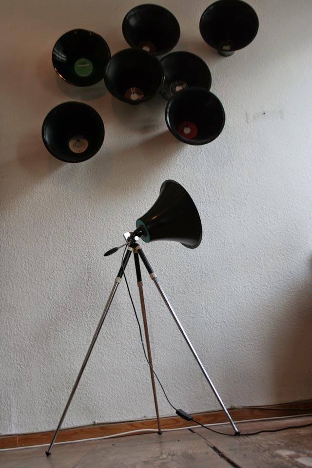 A Clever Upcycled Lamp Made Out of an Old Vinyl Record and a Camera Tripod