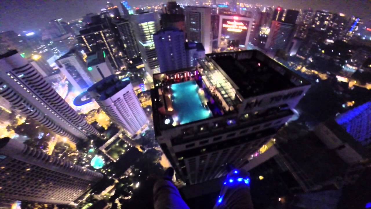BASE Jumper Leaps Off the KL Tower in Kuala Lumpur and Lands in a ...
