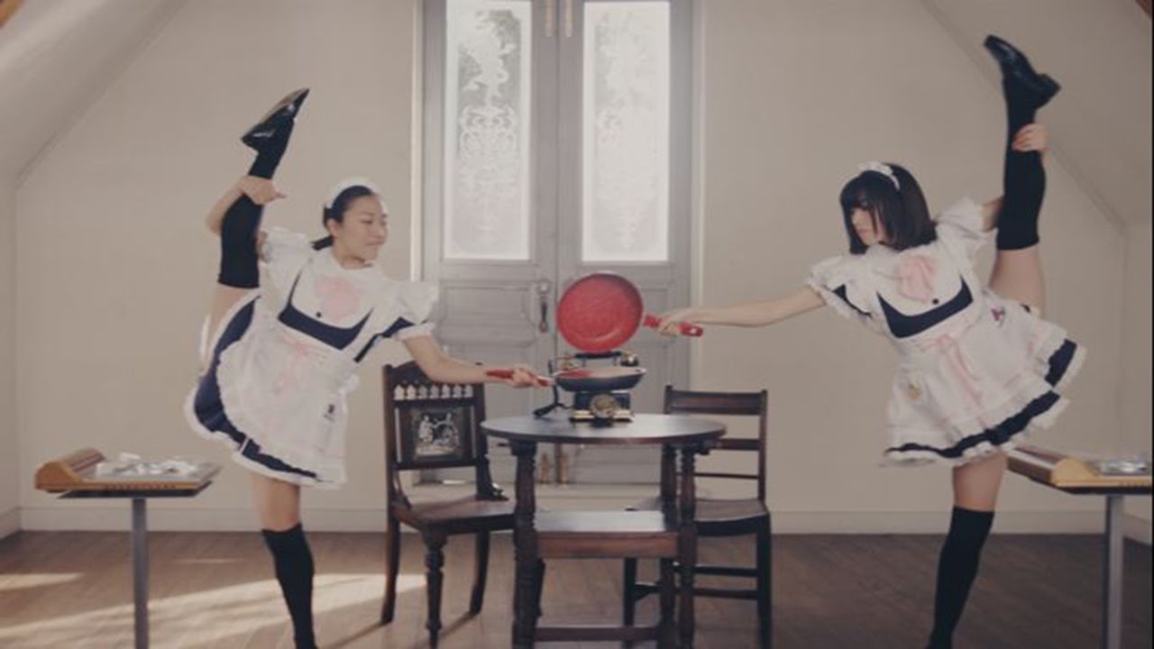 A Bizarre Japanese Commercial Featuring 100 Maids With 100 Frying Pans ...