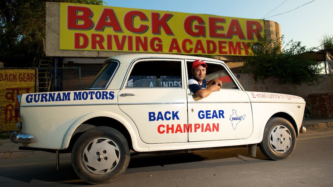 Man Drives a Customized Car Backwards Through the Streets and Highways ...