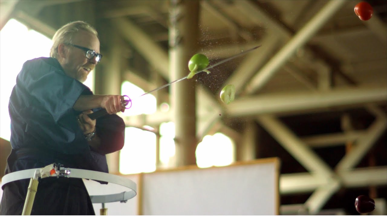Adam Savage Slices Airborne Fruit With a Sword in Slow Motion on ...