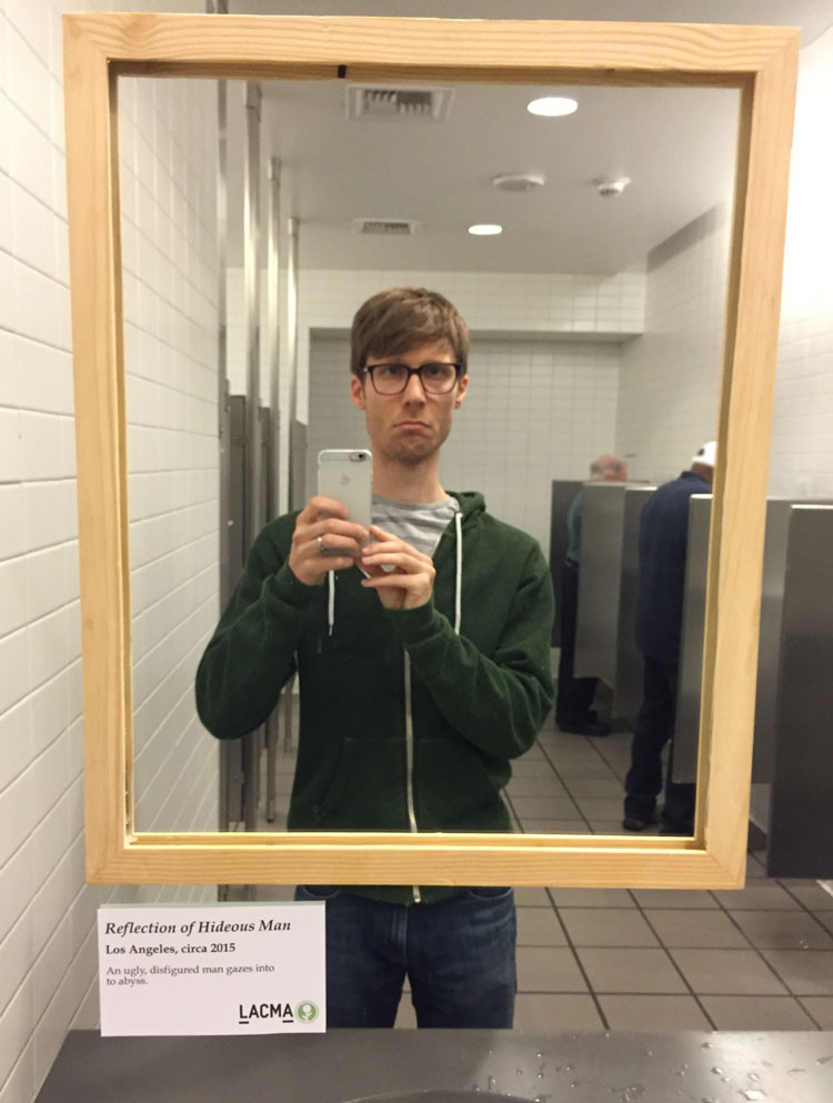 'Reflection of Hideous Man', A Picture Frame on a Men's Bathroom Mirror ...