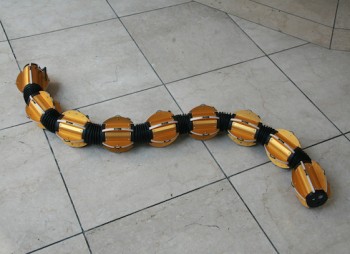 A Slithering Snake Robot That Can Swim Underwater With Unsettling Ease