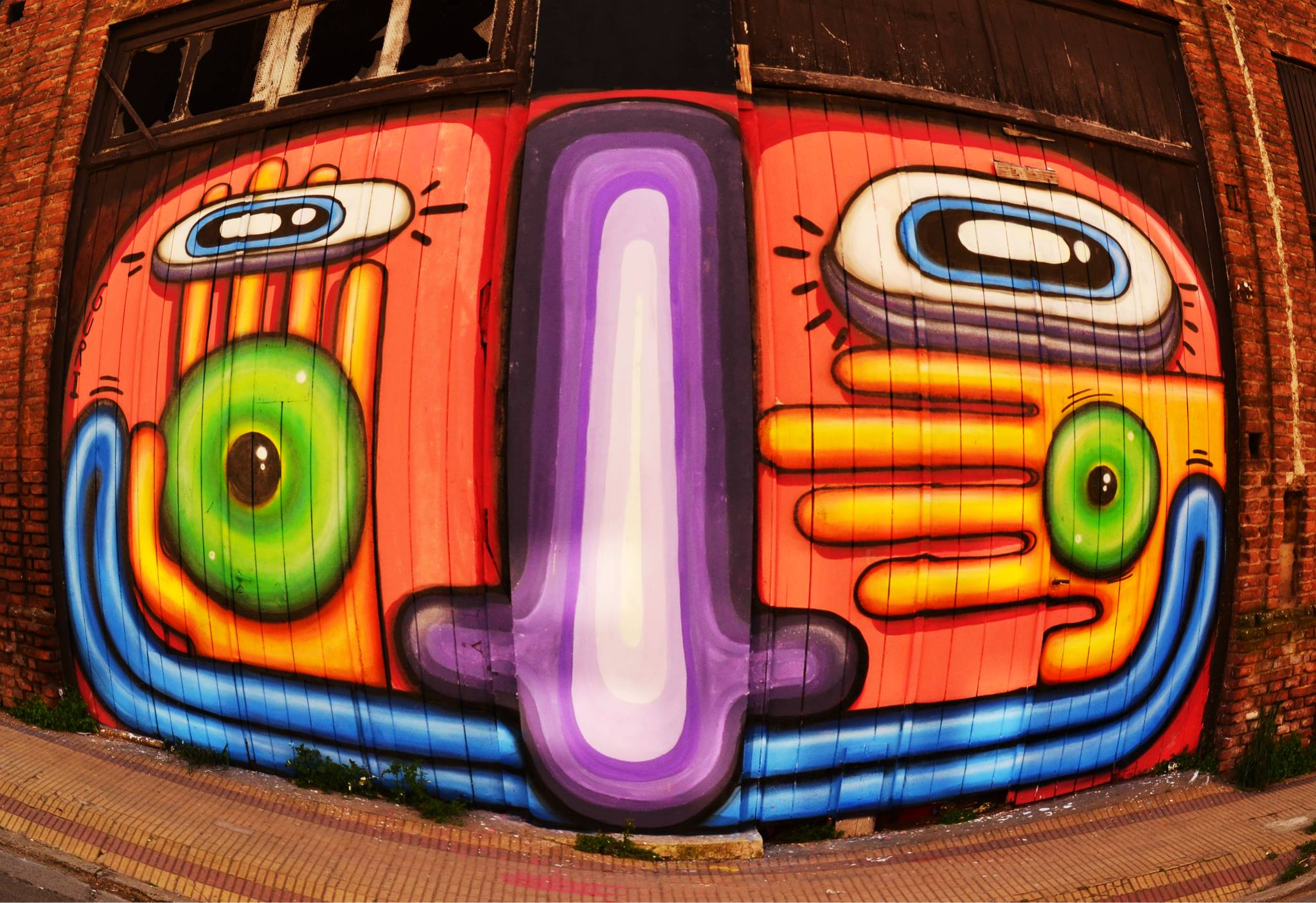 Playful Character Street Art by Guri