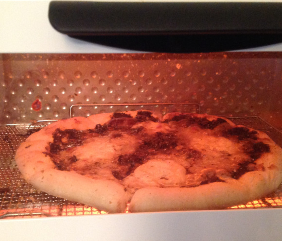 Japanese Company Creates a Frozen Squid Ink Pizza That Can Be Prepared ...