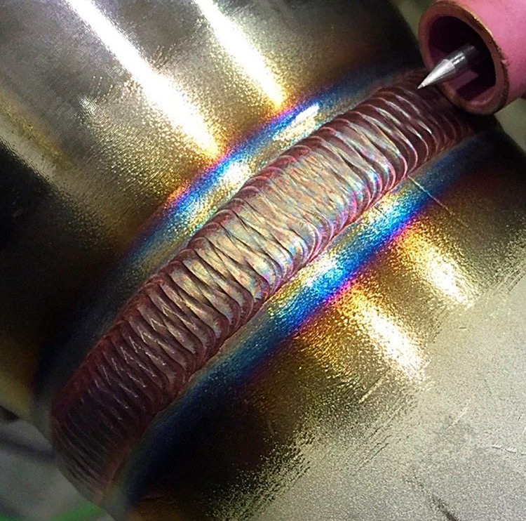 Colorful and Elaborate Designs Welded Onto Pipes