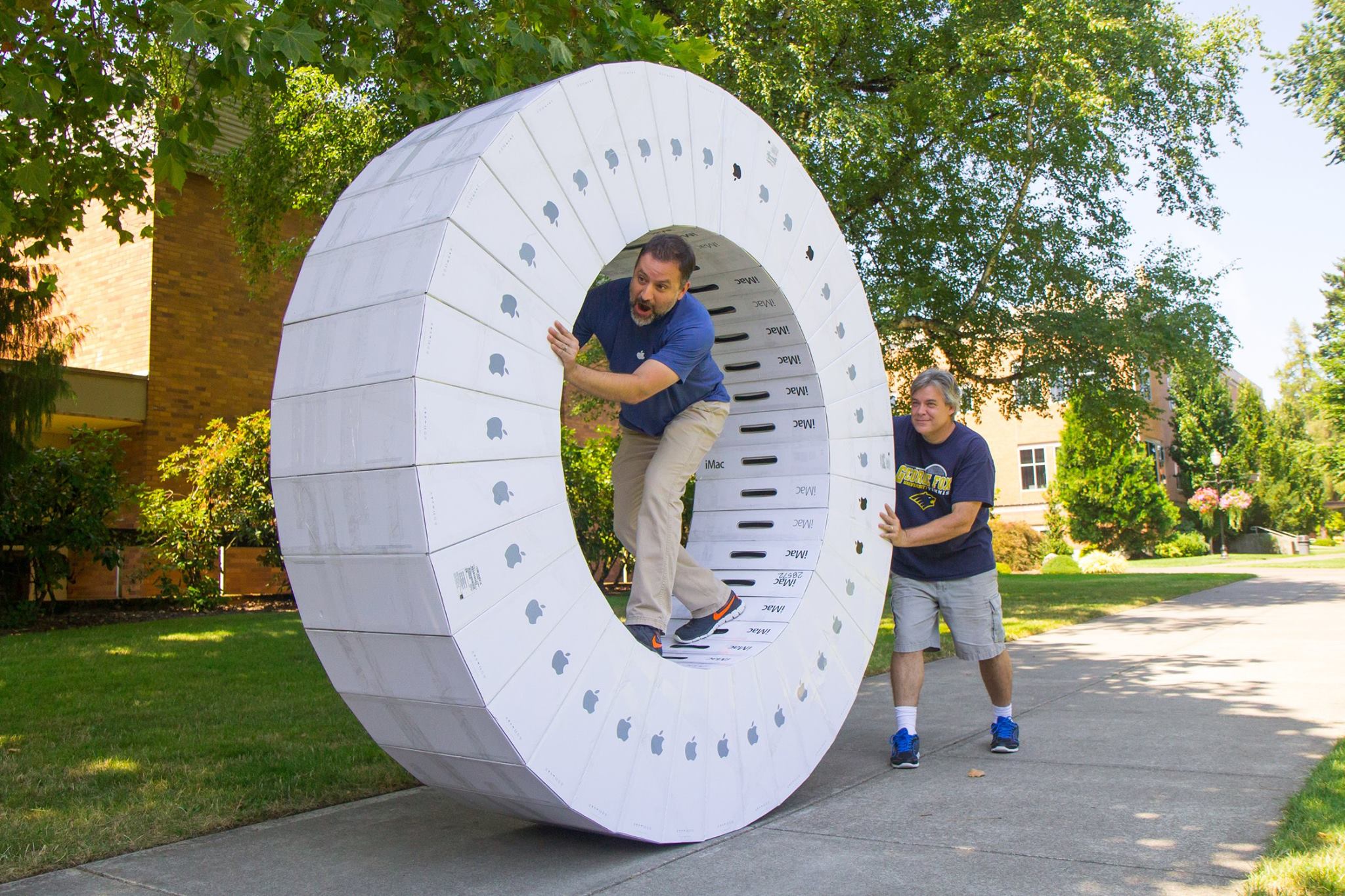 iWheel, A Giant Human Hamster Wheel Created Using 36 Empty iMac Boxes