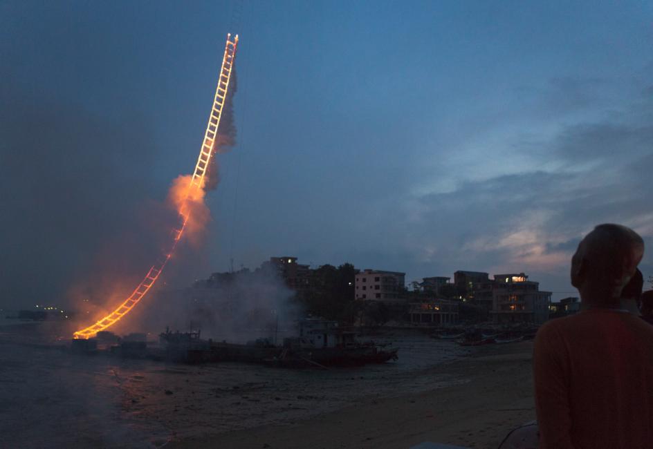 A Burning Ladder of Pyrotechnics Reaches 500 Meters Into the Air Before ...