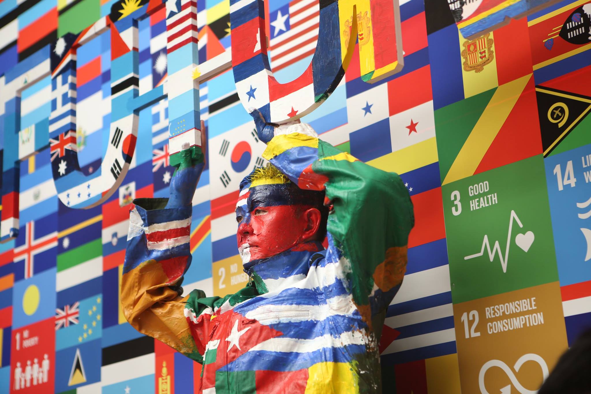 'Invisible Man' Liu Bolin Camouflages Himself Into a Mosaic Made Up of ...