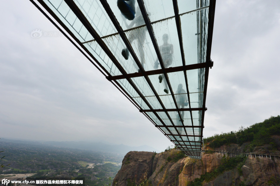 The World's Longest Glass Suspension Bridge Opens in China's Hunan Province