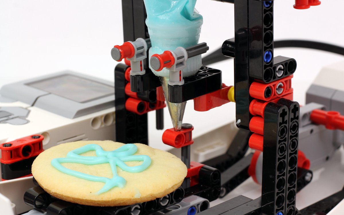 A Clever Machine That Ices Cookies With Festive Designs Built Using ...