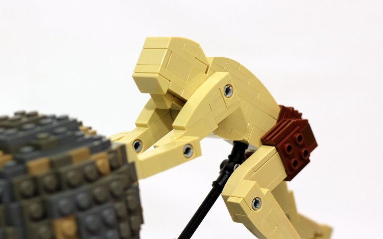 A Kinetic LEGO Sculpture of Sisyphus Endlessly Pushing His Boulder Up a ...