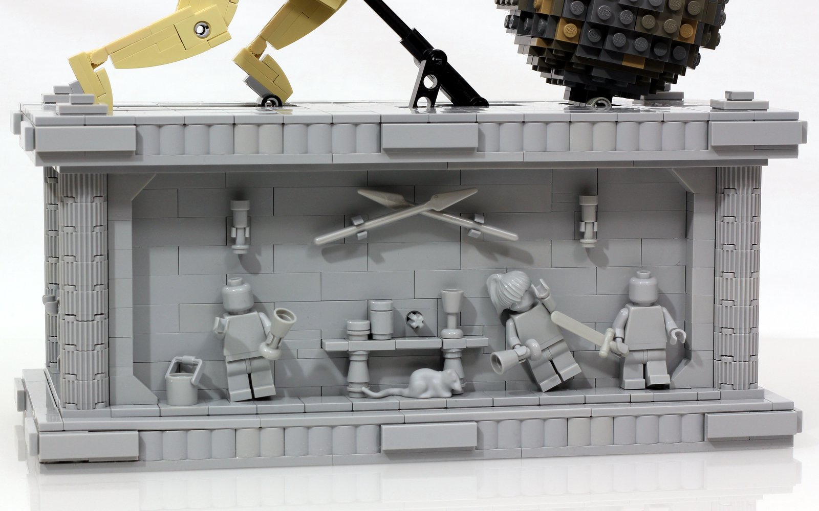 A Kinetic LEGO Sculpture of Sisyphus Endlessly Pushing His Boulder Up a ...