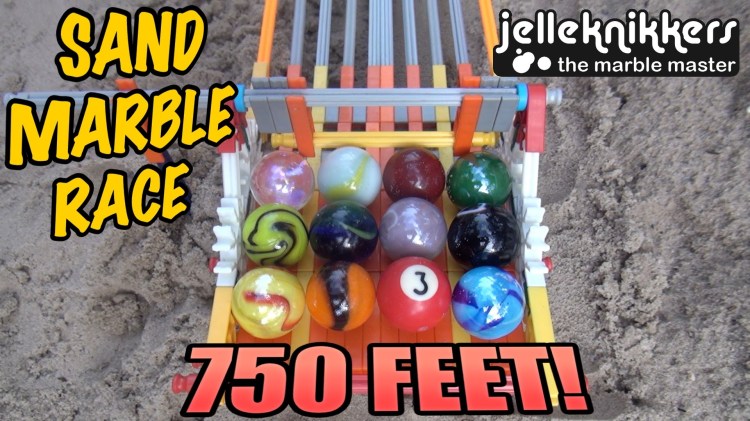 Marbles Competing Against Each Other in a 750 Foot Race in the Sand