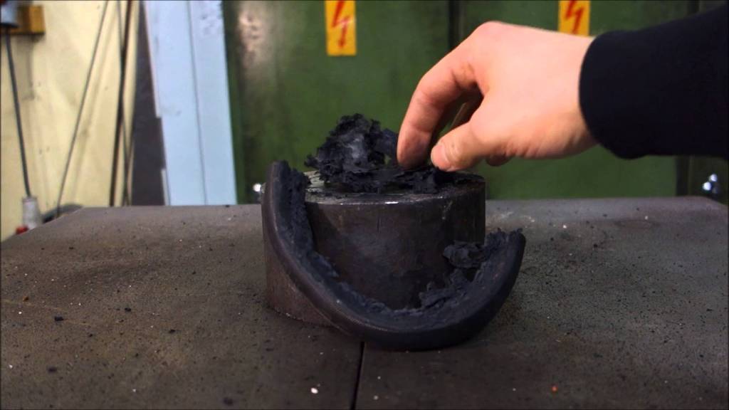 Crushing a Hockey Puck Using a Hydraulic Press