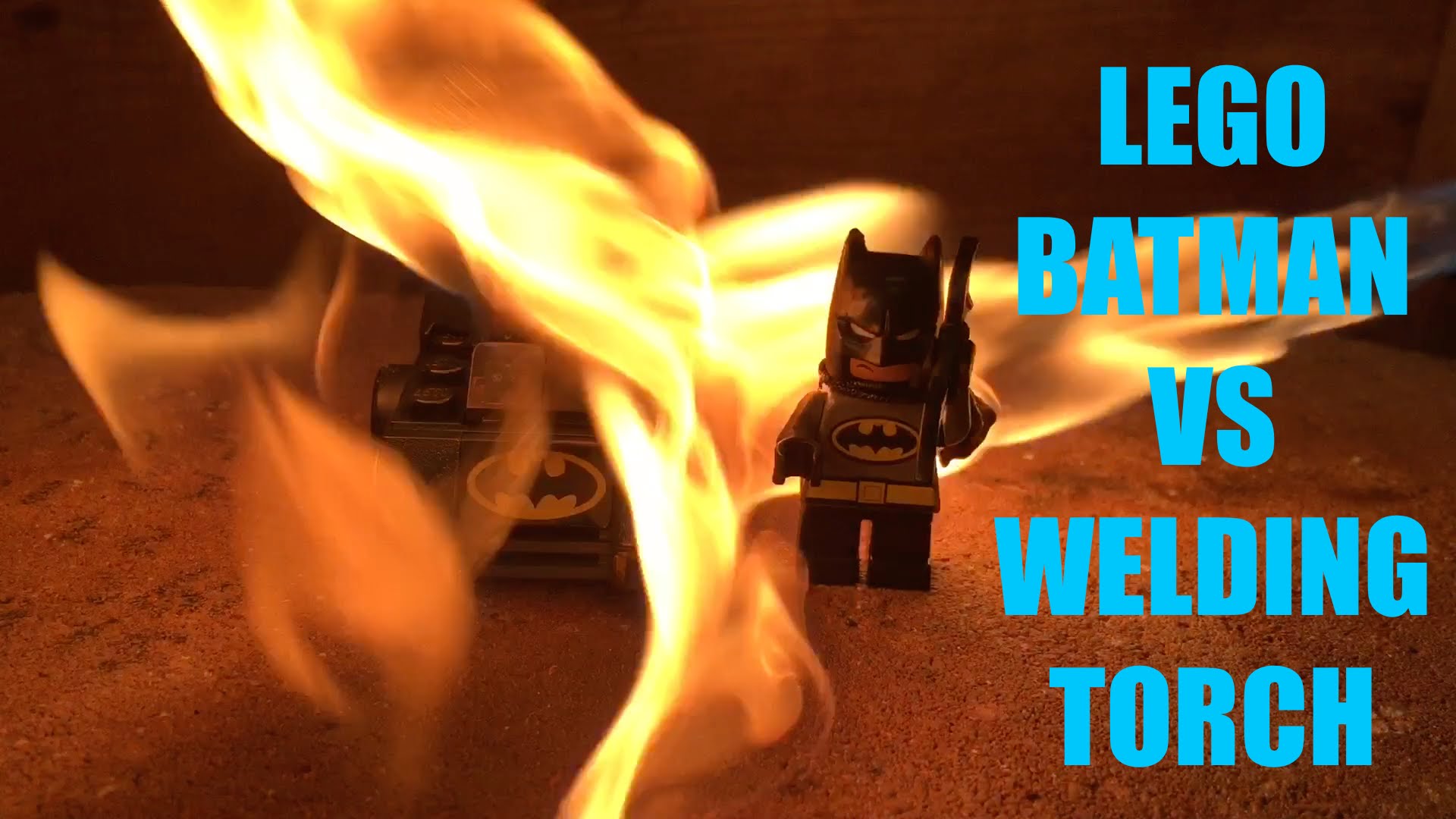 LEGO Batman and His Batmobile Being Melted Using a Welding Torch