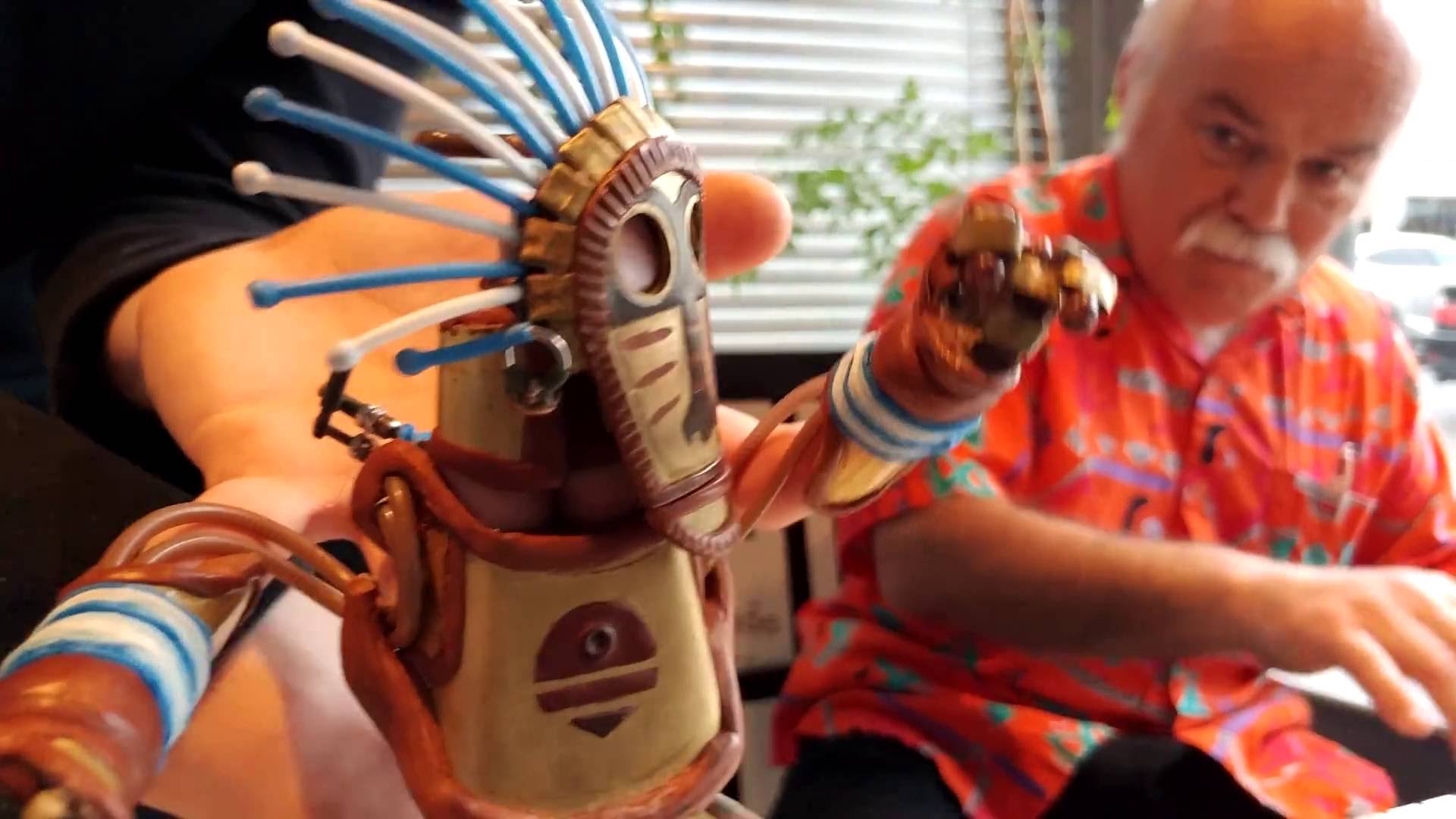 A Brilliantly Designed Warrior Puppet Dances to Music Played by an ...