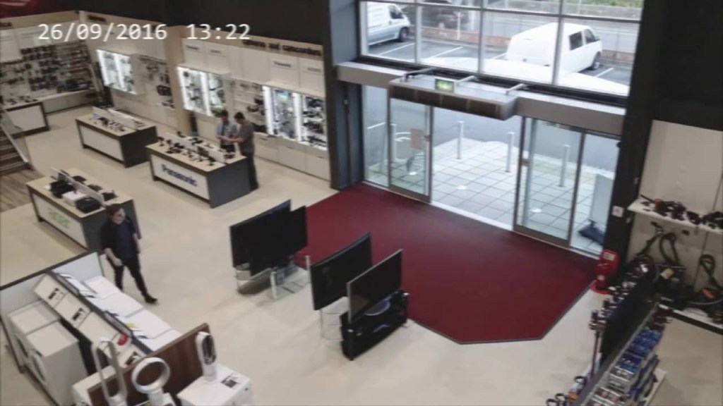 Customer Accidentally Knocks Over Televisions on Display in a Store ...