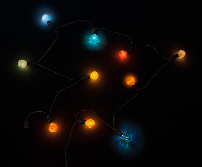 A String of Colorful Planetary Holiday Lights Representing Our Solar System