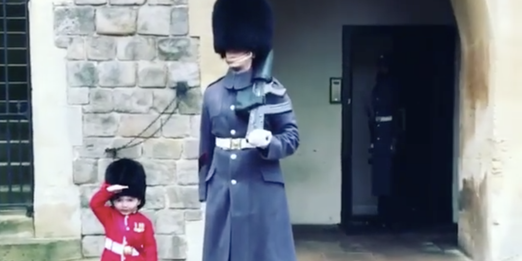 Little Boy Dressed as a Guard Salutes a Real Guard During the Changing ...