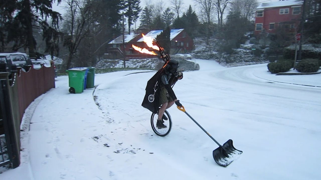 The Unipiper Dresses as Darth Vader and Shovels Snow While Playing His ...