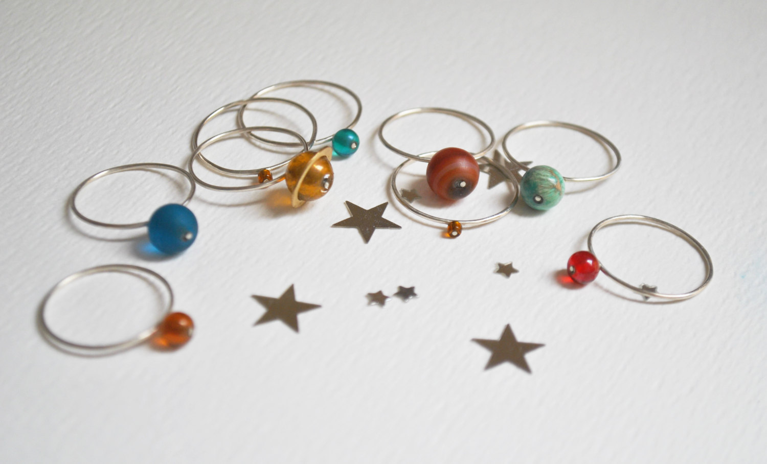 A Cleverly Designed Set of Stackable Planetary Rings That Form a Tiny ...