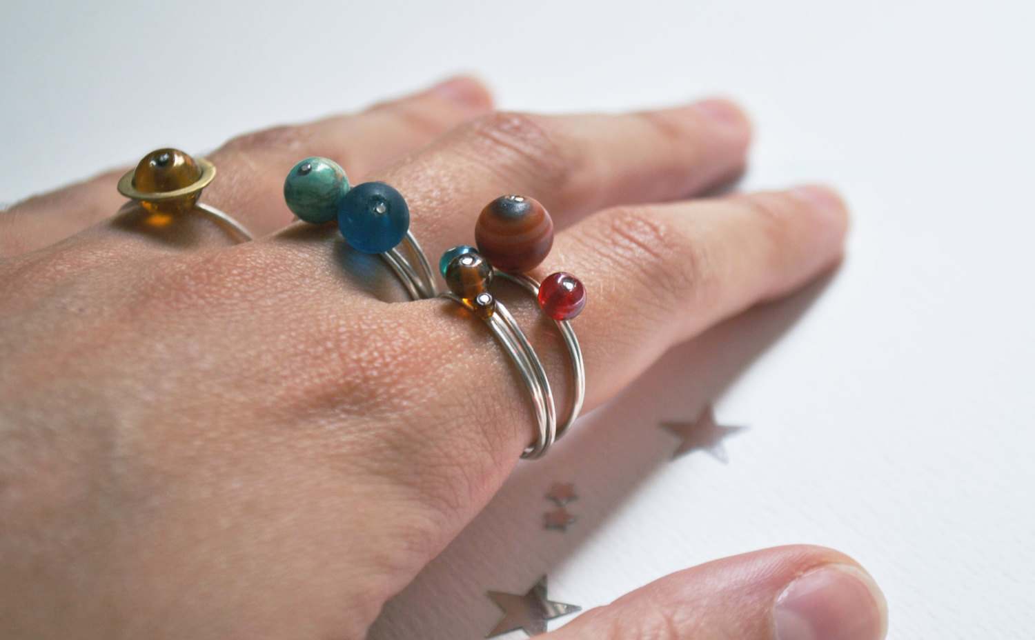 A Cleverly Designed Set of Stackable Planetary Rings That Form a Tiny ...