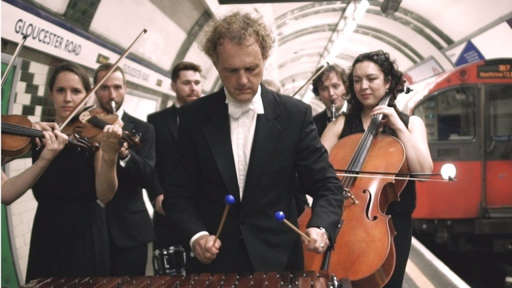 A Small Orchestra Plays an Amusing Medley of Classic Apple Ringtones as ...