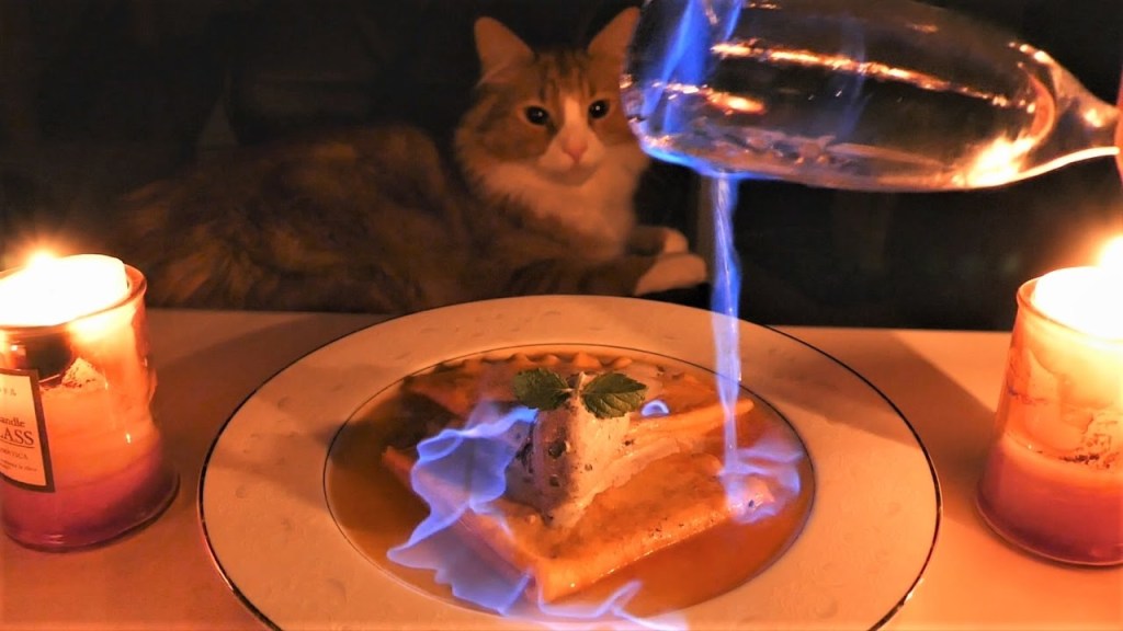 Talented Cook Prepares a Fiery Recipe of Crepes Suzette Under the ...