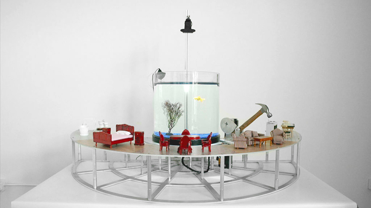 A Goldfish Controlled Hammer That Rotates Around a Semicircle Smashing ...