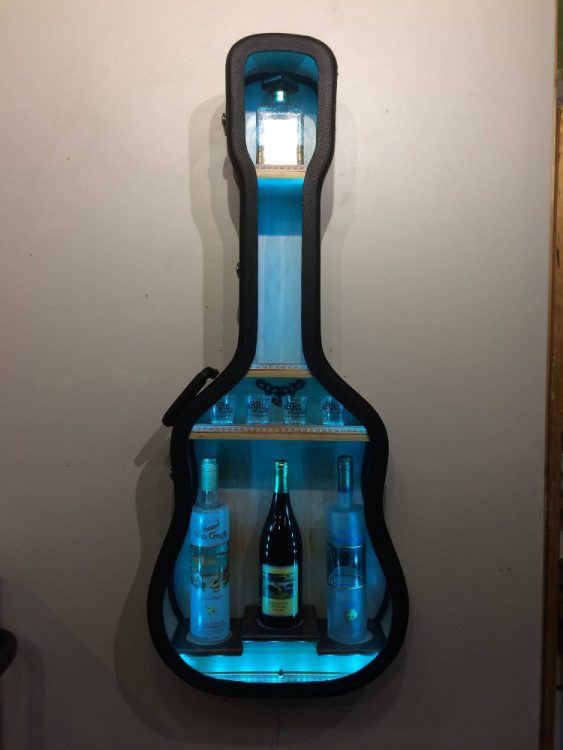 A Gorgeous Line of Amazing Shelves Built Into the Hollowed Bodies of ...