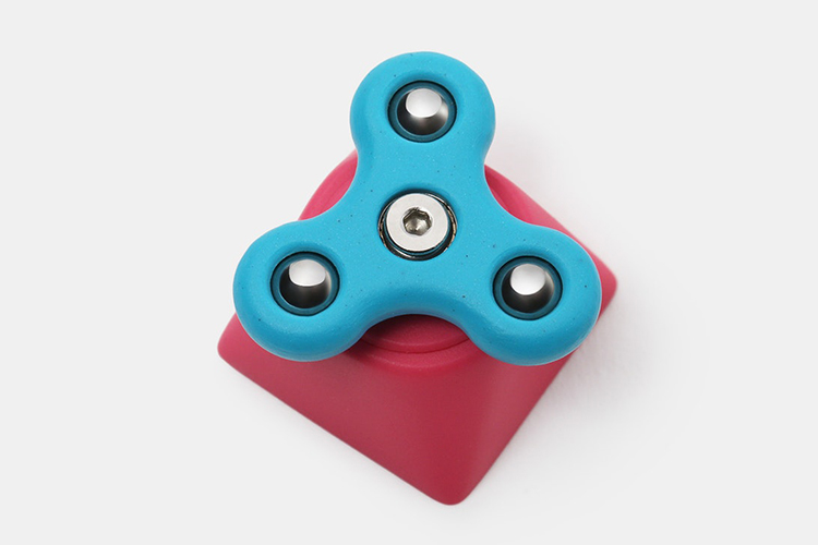Colorful Custom Keyboard Keys With Tiny Fidget Spinners Mounted on Top