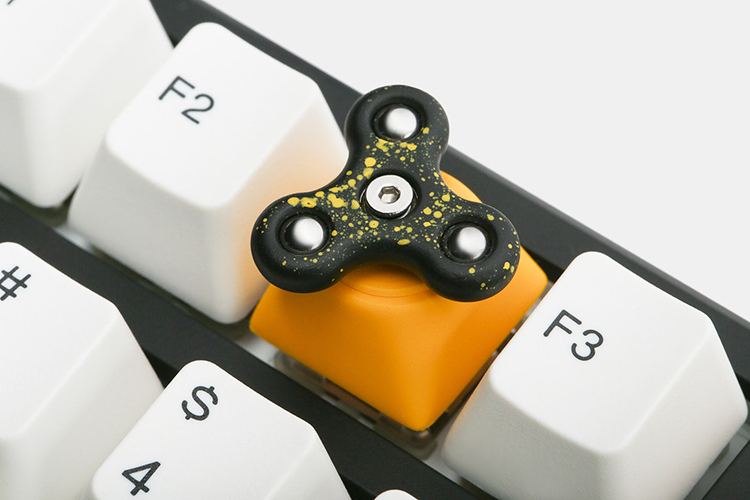 Colorful Custom Keyboard Keys With Tiny Fidget Spinners Mounted on Top