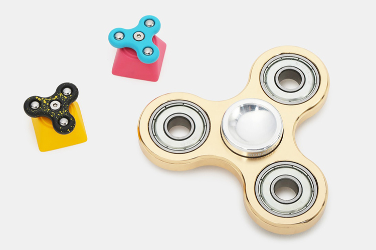 Colorful Custom Keyboard Keys With Tiny Fidget Spinners Mounted on Top