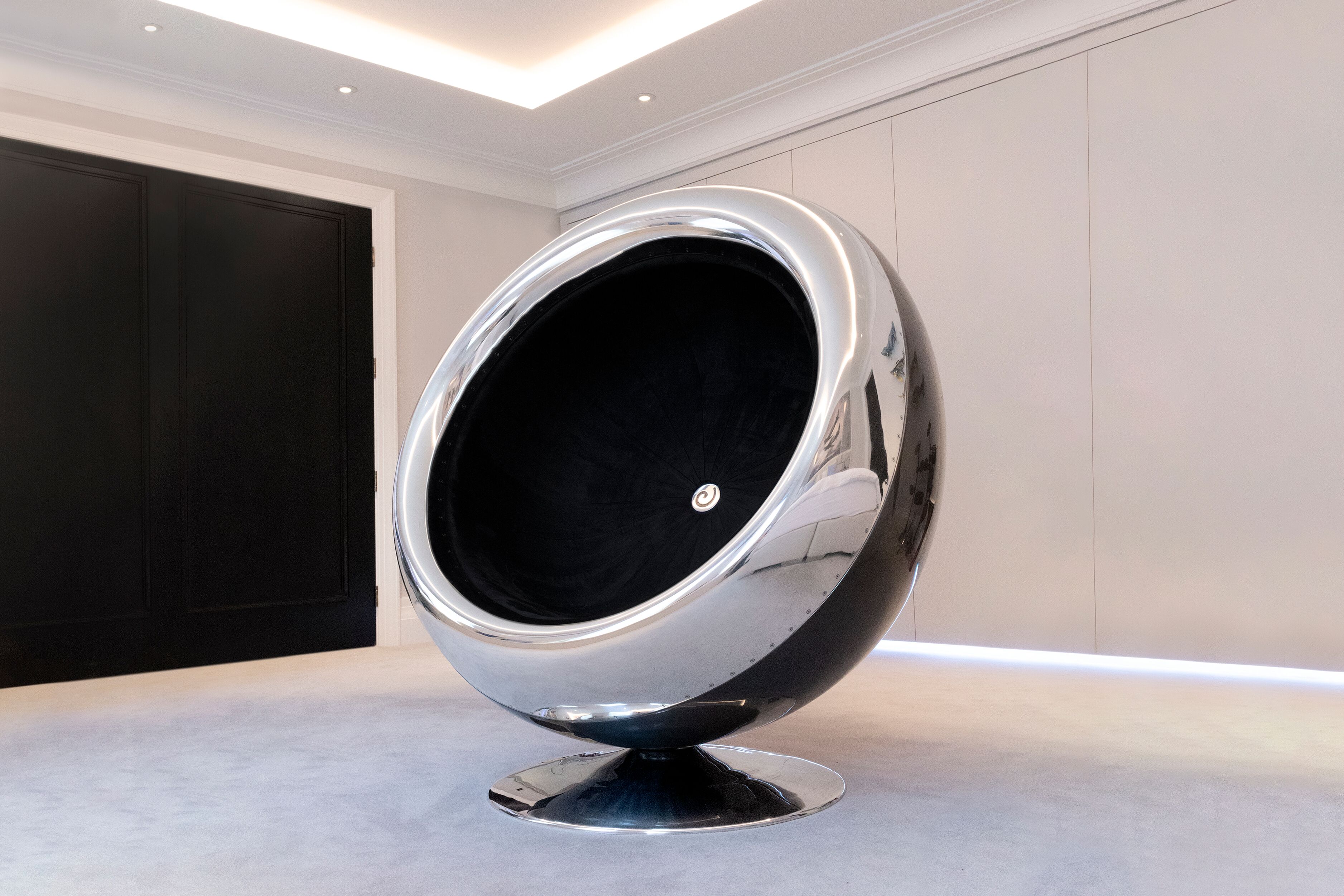 An Ultra Modern Enclosed Chair Made Out of a Jet Engine Cowling From a ...