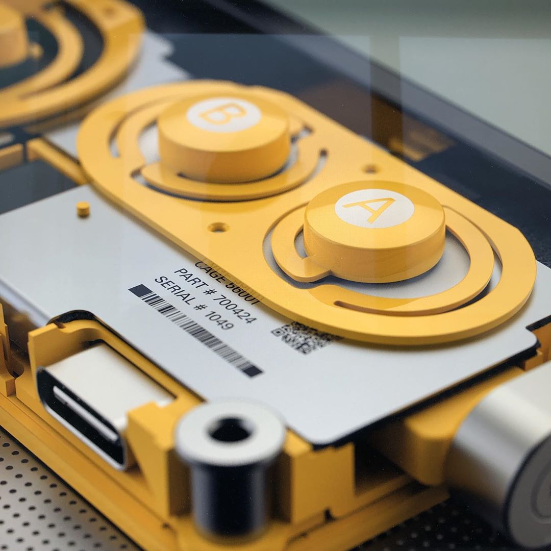 Playdate, A Retro Yellow Crank Controlled Handheld Gaming System With a ...