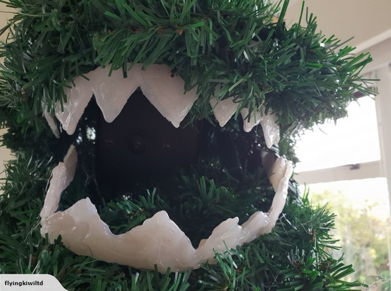 A Magnificent Smoke Breathing Godzilla Christmas Tree