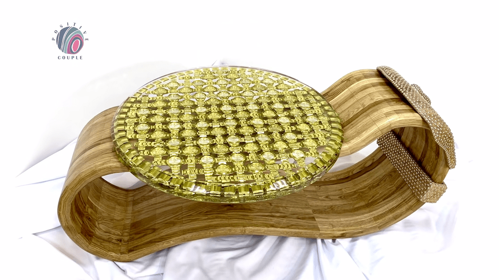 An Unusual Wristwatch Shaped Oak Table Featuring 68 Gold Watches ...