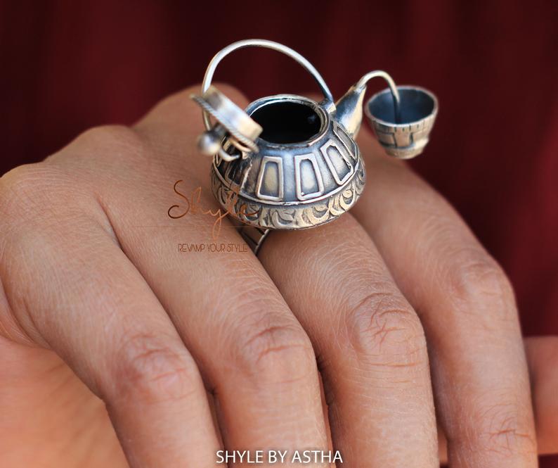 A Detailed Sterling Silver Chai Tea Kettle and Cup Ring