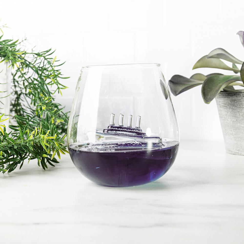 An Amusing Cocktail Glass Featuring a Forlorn Ship That Appears to Sink ...