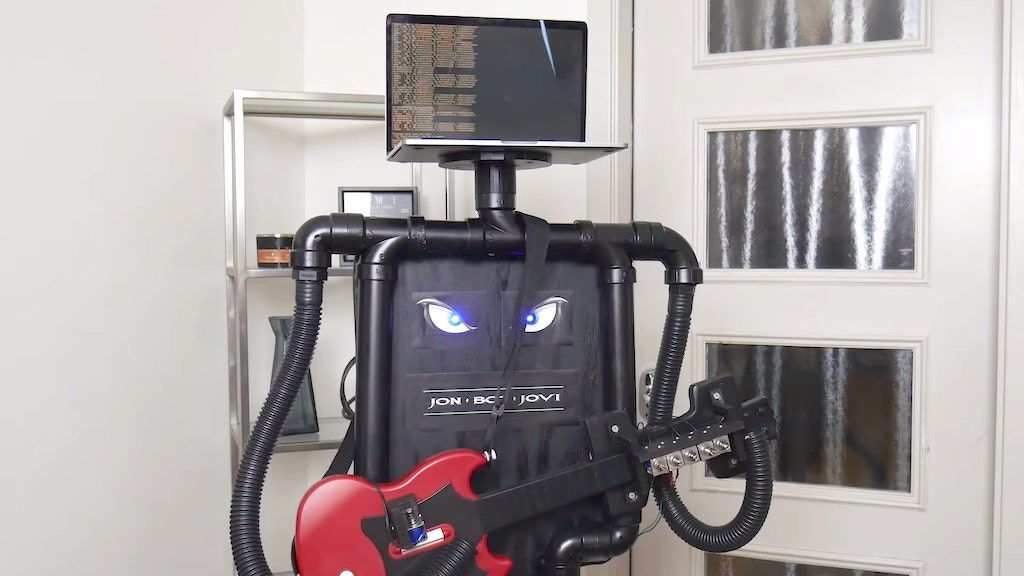 Engineer Builds a Robot That Plays 'Guitar Hero' Solos