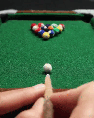 A Stop Motion Break Shot on a Tiny Felt Pool Table