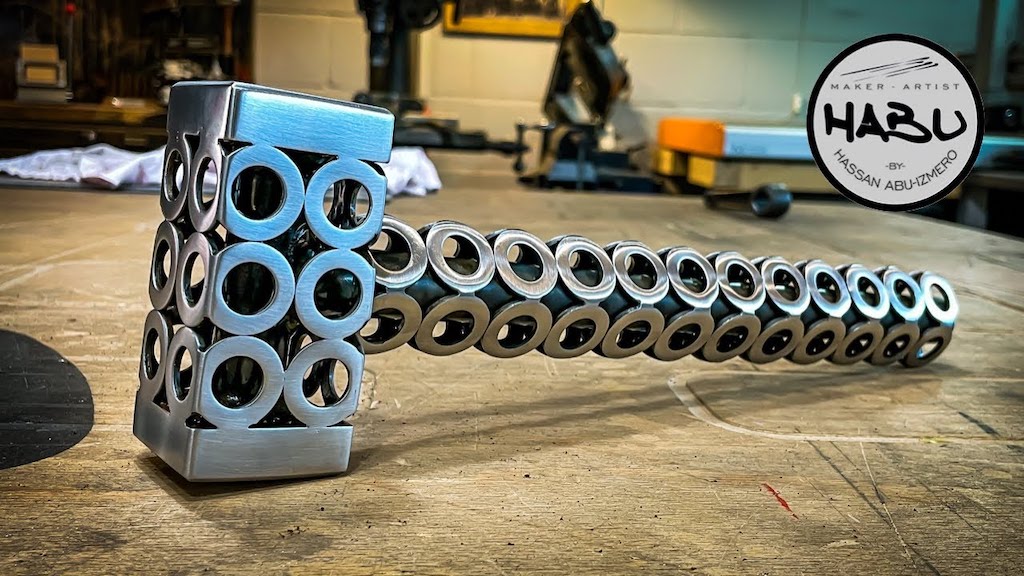 Craftsman Builds a Steel Hammer Using Washers